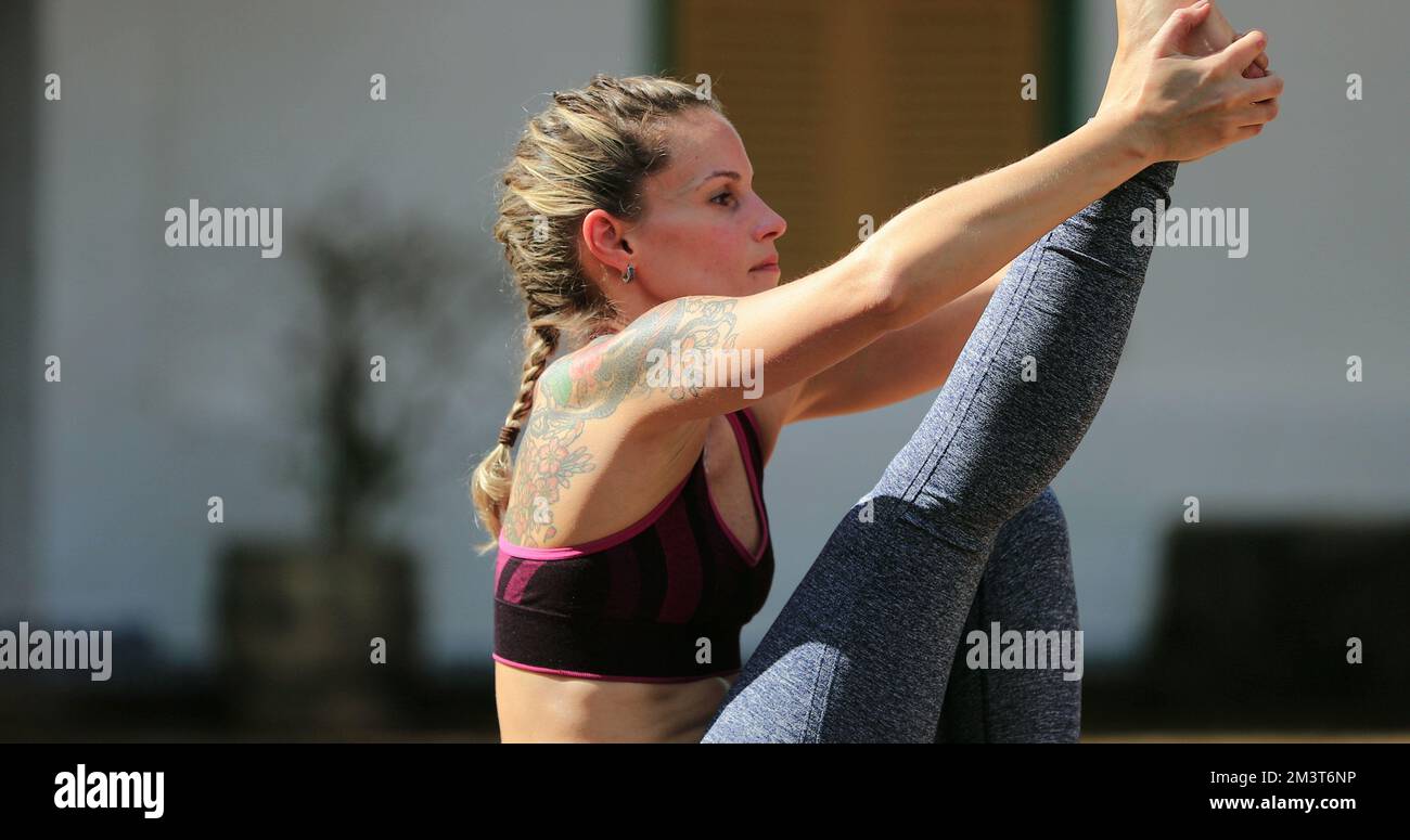 Yogi fit woman training Yoga strength asana pose Stock Photo - Alamy