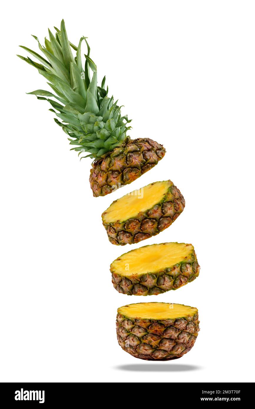 Flying fresh ripe pineapple slices isolated on a white background Stock ...