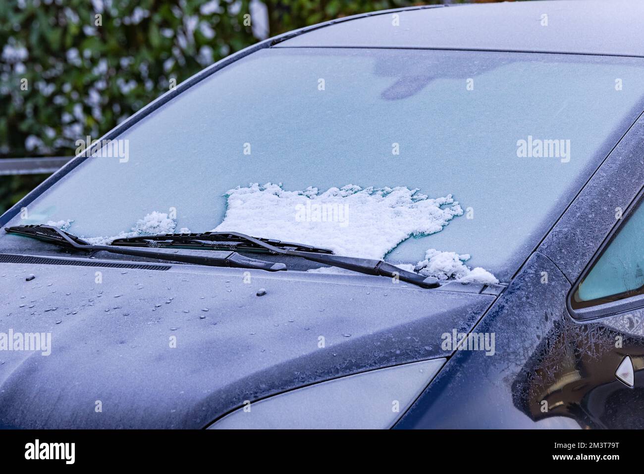 An iced windshield on a car in the early morning in winter Stock Photo ...