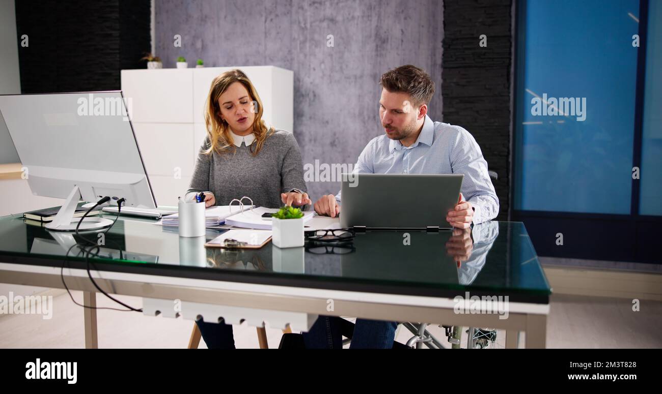 Business Man Employee Working In Office With Colleague Stock Photo - Alamy