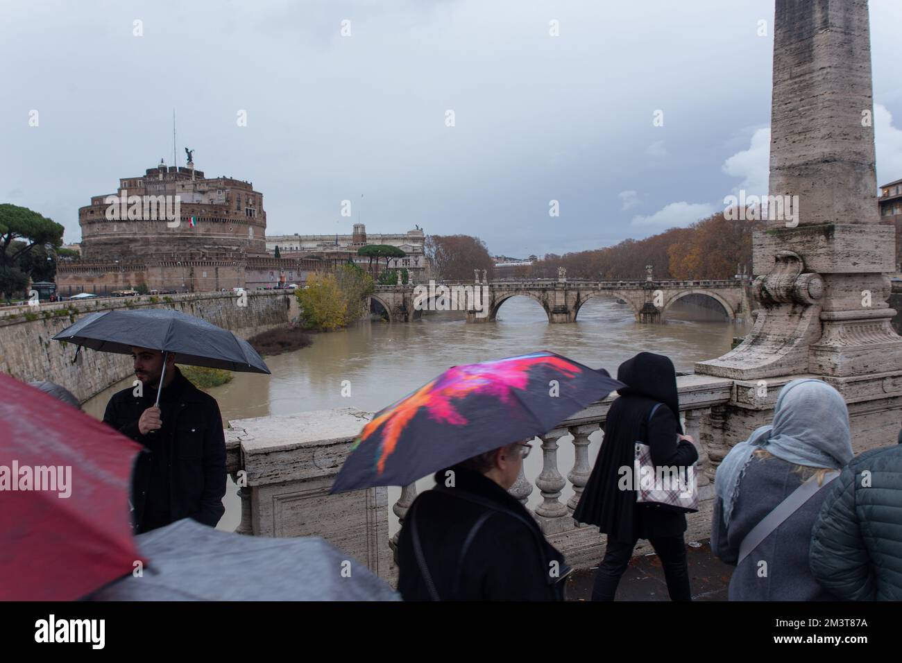 Rome, Italy. 16th Dec, 2022. Some people stop on the bridges to watch ...
