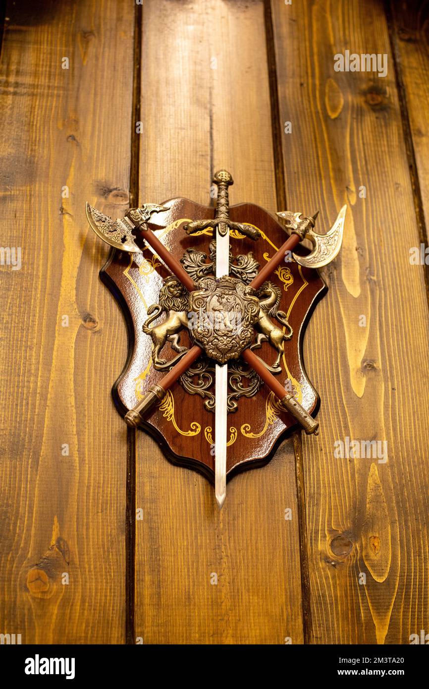 A vertical shot of a shield and sword - pirate symbol Stock Photo - Alamy