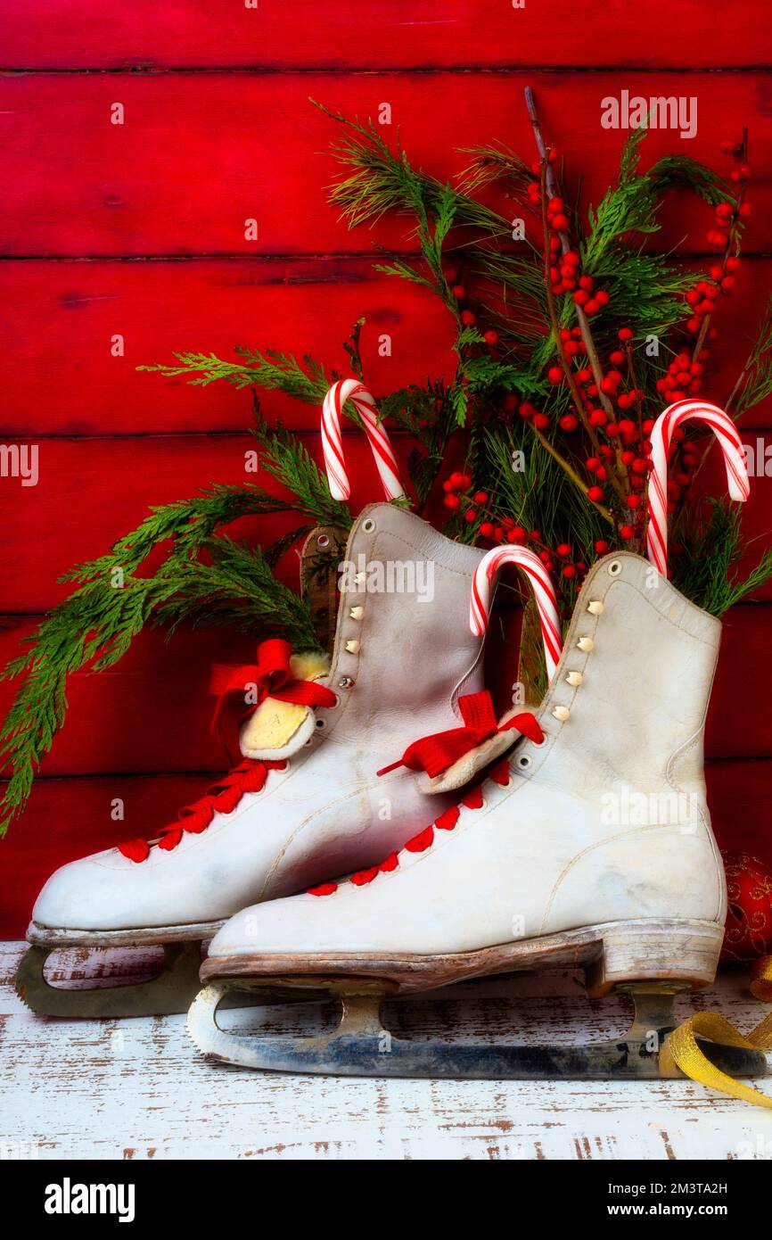 Vintage Womens Ice Skates And Candy Canes Still Life Stock Photo - Alamy