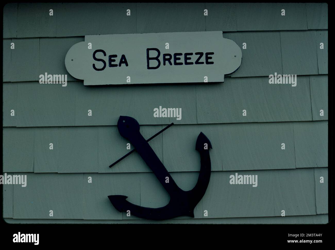'Sea Breeze' sign and representation of anchor on wall , Signs Notices ...