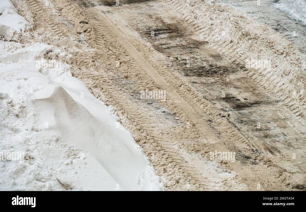 Dirty impassable road after a snowfall Stock Photo - Alamy