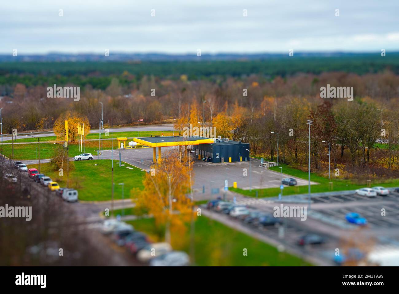 Gas station on the street in fall Stock Photo - Alamy