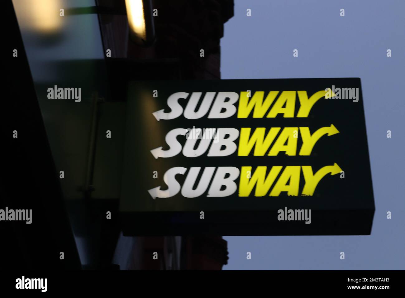 A low-angle shot of a Subway board in Leeds City Centre Stock Photo - Alamy