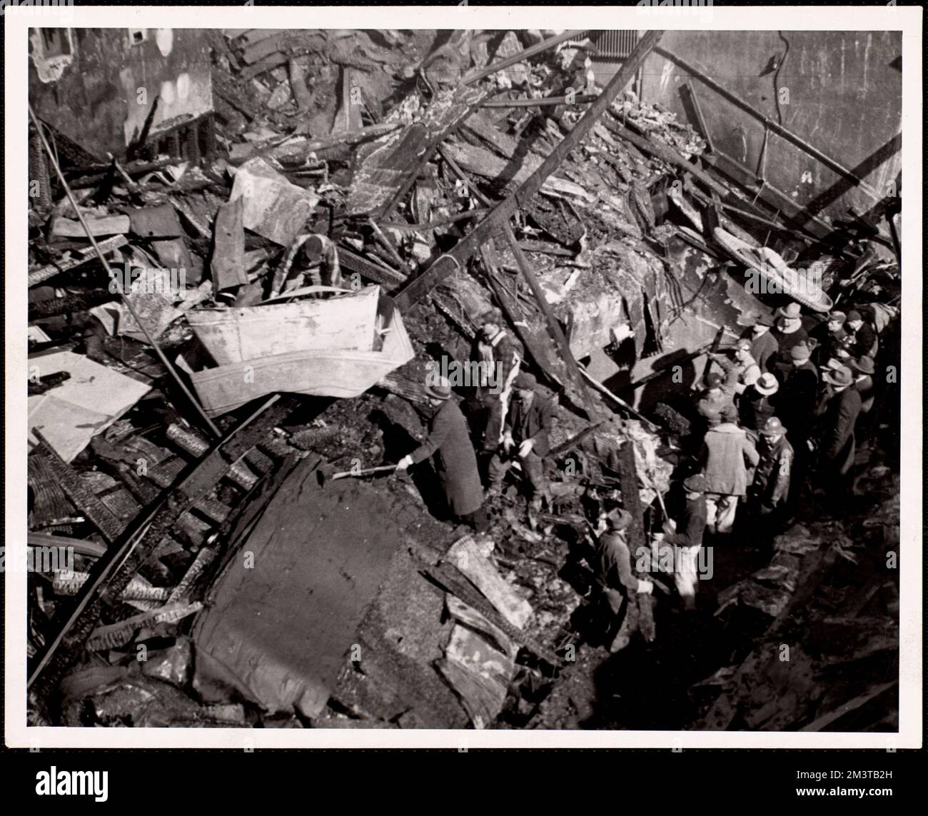 Searching for bodies,Strand Theatre fire , Fires, Shoe industry ...