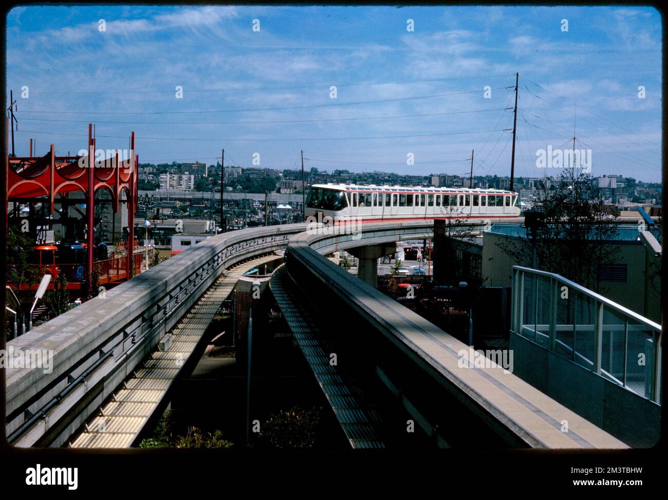 Seattle Center Monorail coming around curve on elevated track ...