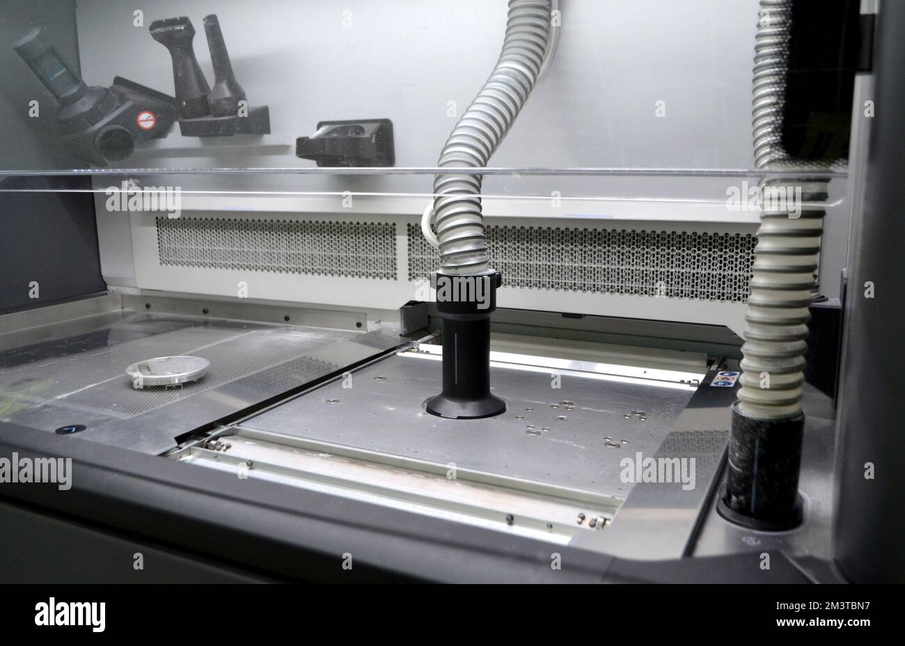 Powder part of 3d printer. Process of pouring polyamide powder through ...