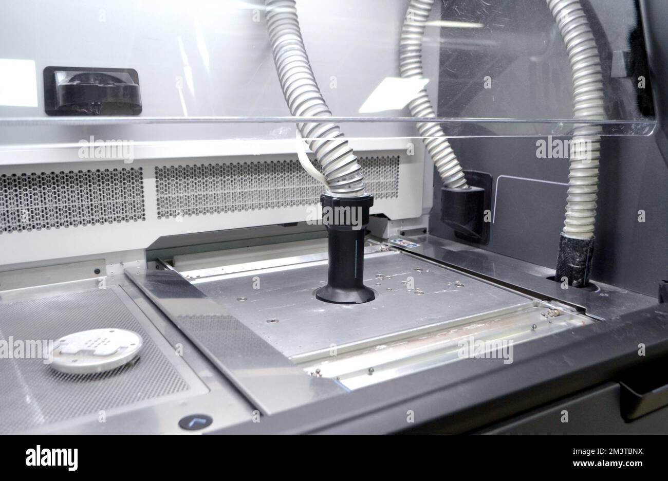 Powder part of 3d printer. Process of pouring polyamide powder through ...