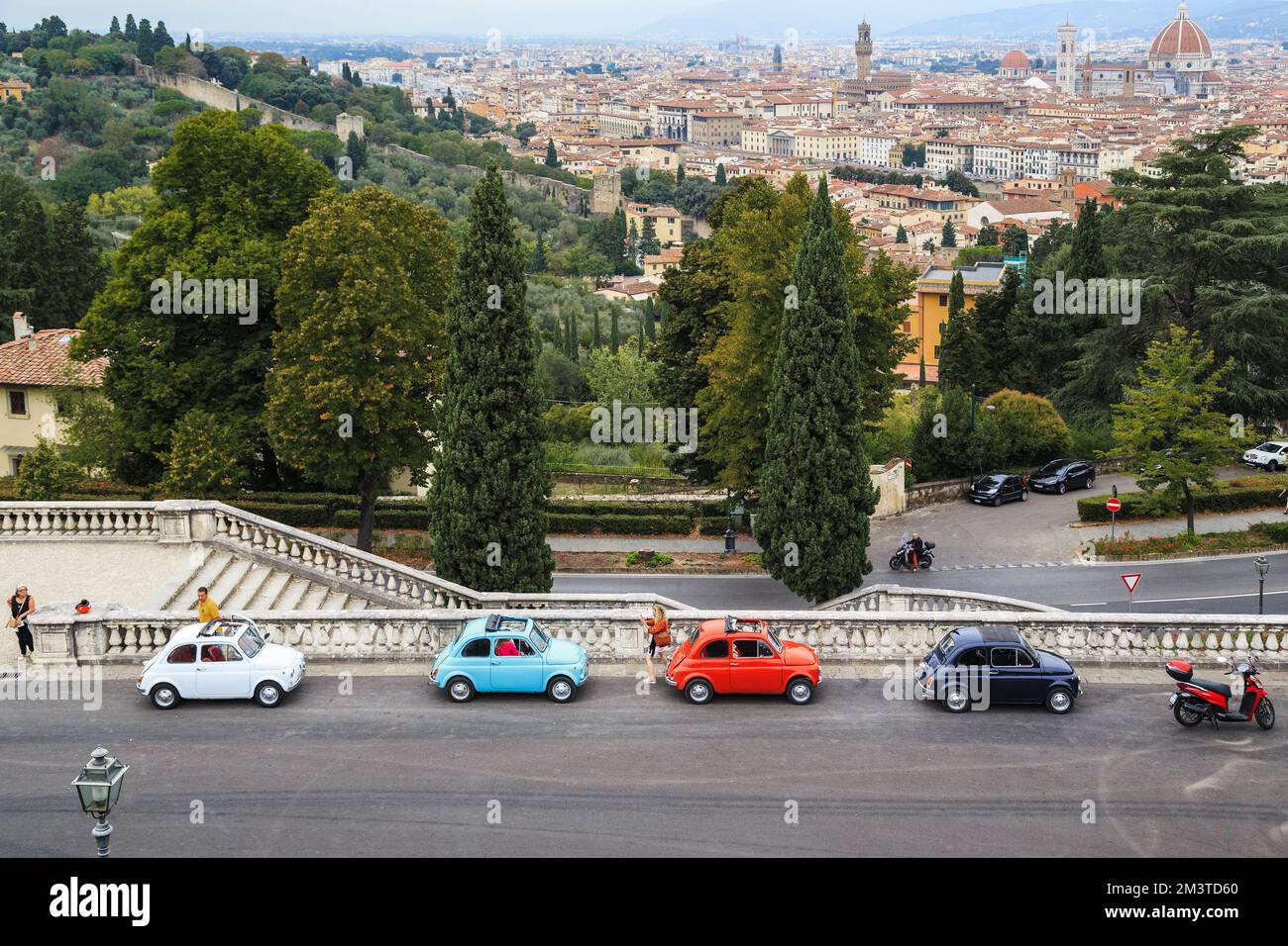 FLORENCE, ITALY - SEPTEMBER 19, 2018: These are the colorful Fiat 500 ...