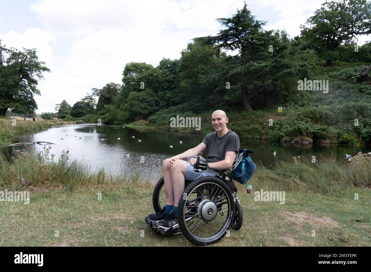 wheelchair user outside Stock Photo - Alamy