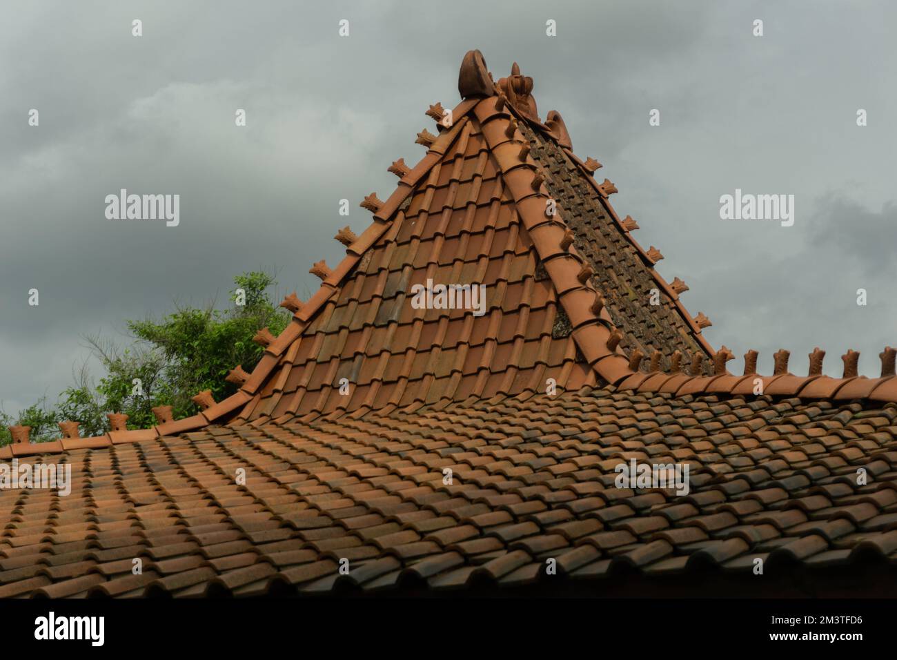 A closeup view of a Javanese house's clay-tiled roof Stock Photo - Alamy