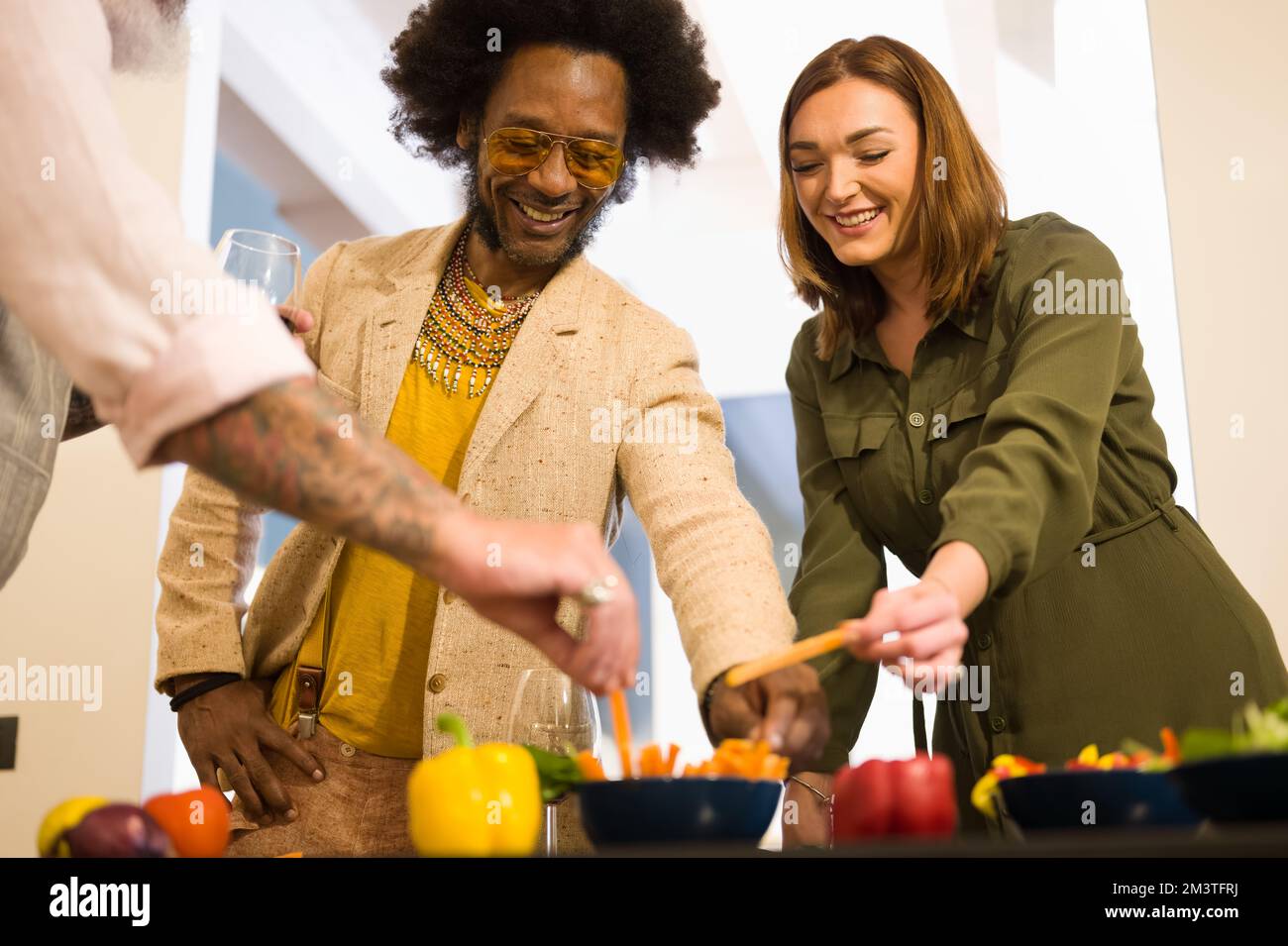Vegan party dinner, people at a vegetarian dinner eating with healthy ...