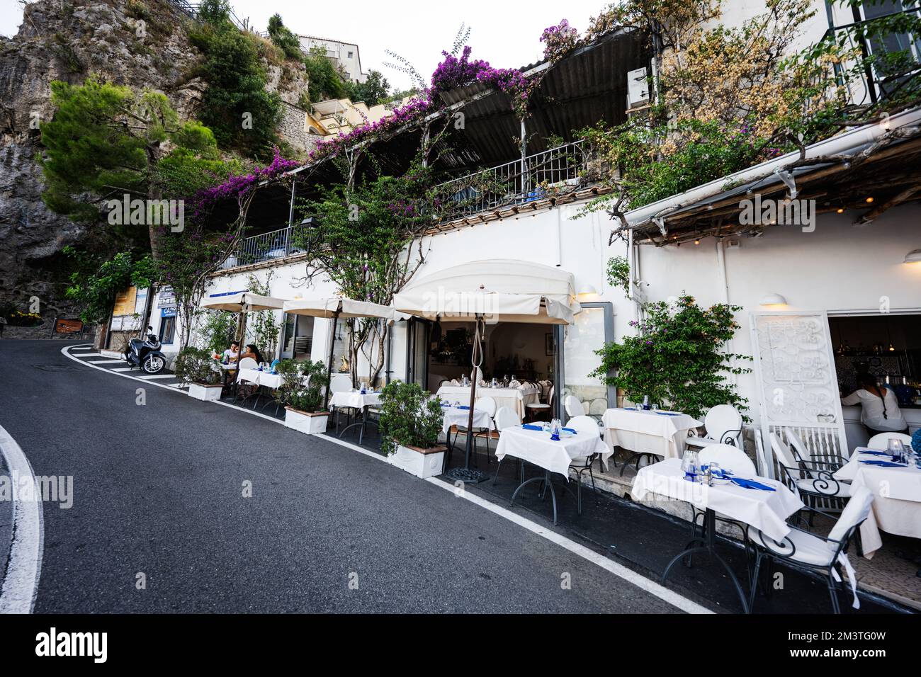 Outdoor terrace tables restaurant in Positano, Italy Stock Photo - Alamy