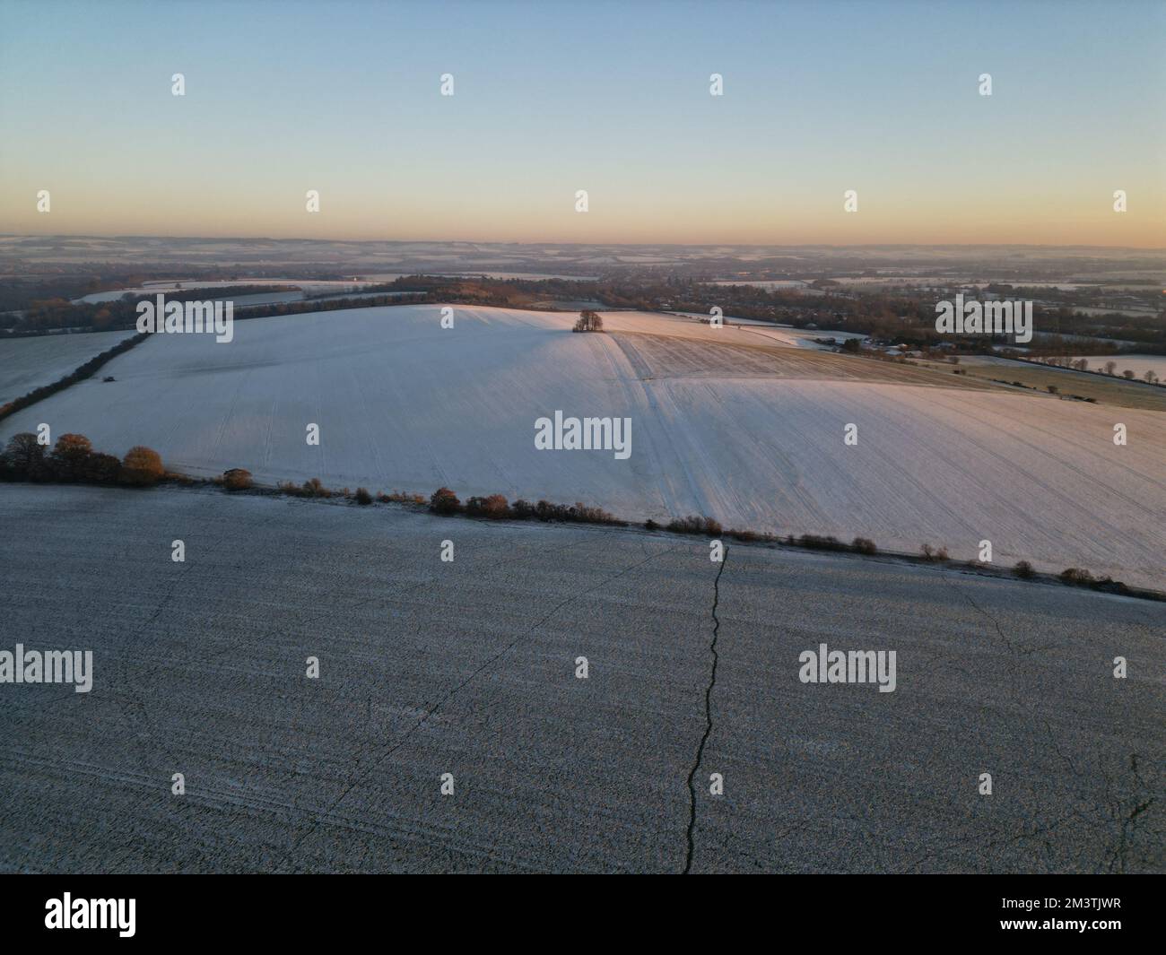 Wittenham Clumps Autumn snow aerial photography. Winter landscape ...