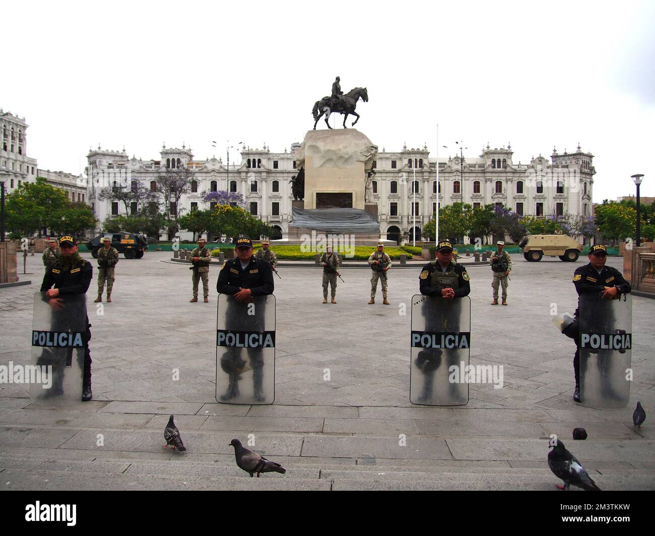 Soldiers and policemen guard the city amid violent protests following ...