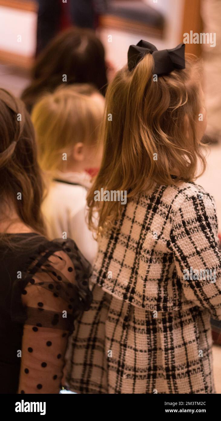 A vertical back view of children playing in a kindergarten Stock Photo ...