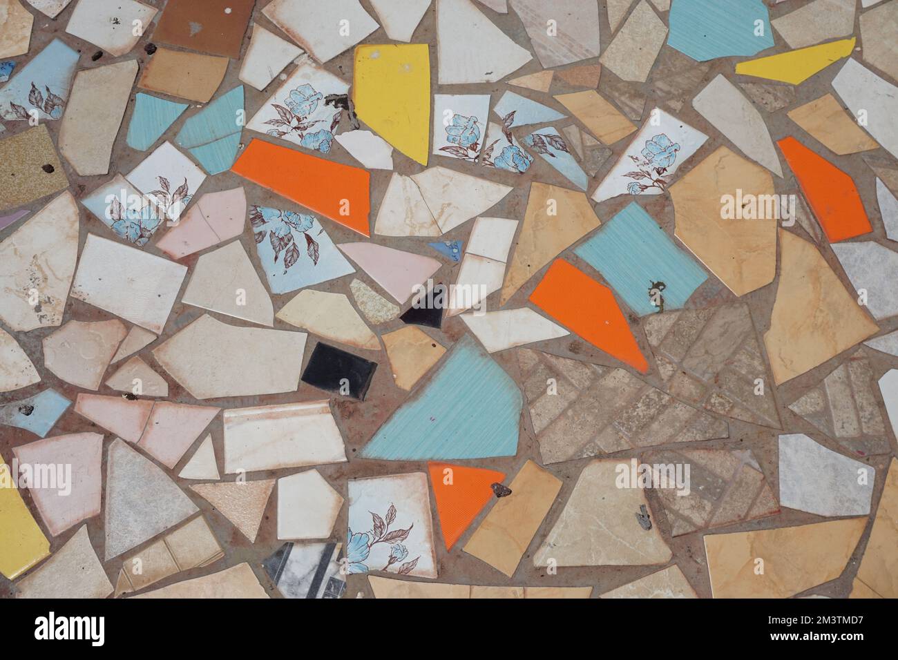 closeup of an unusual texture on the broken ceramic pieces of the floor ...
