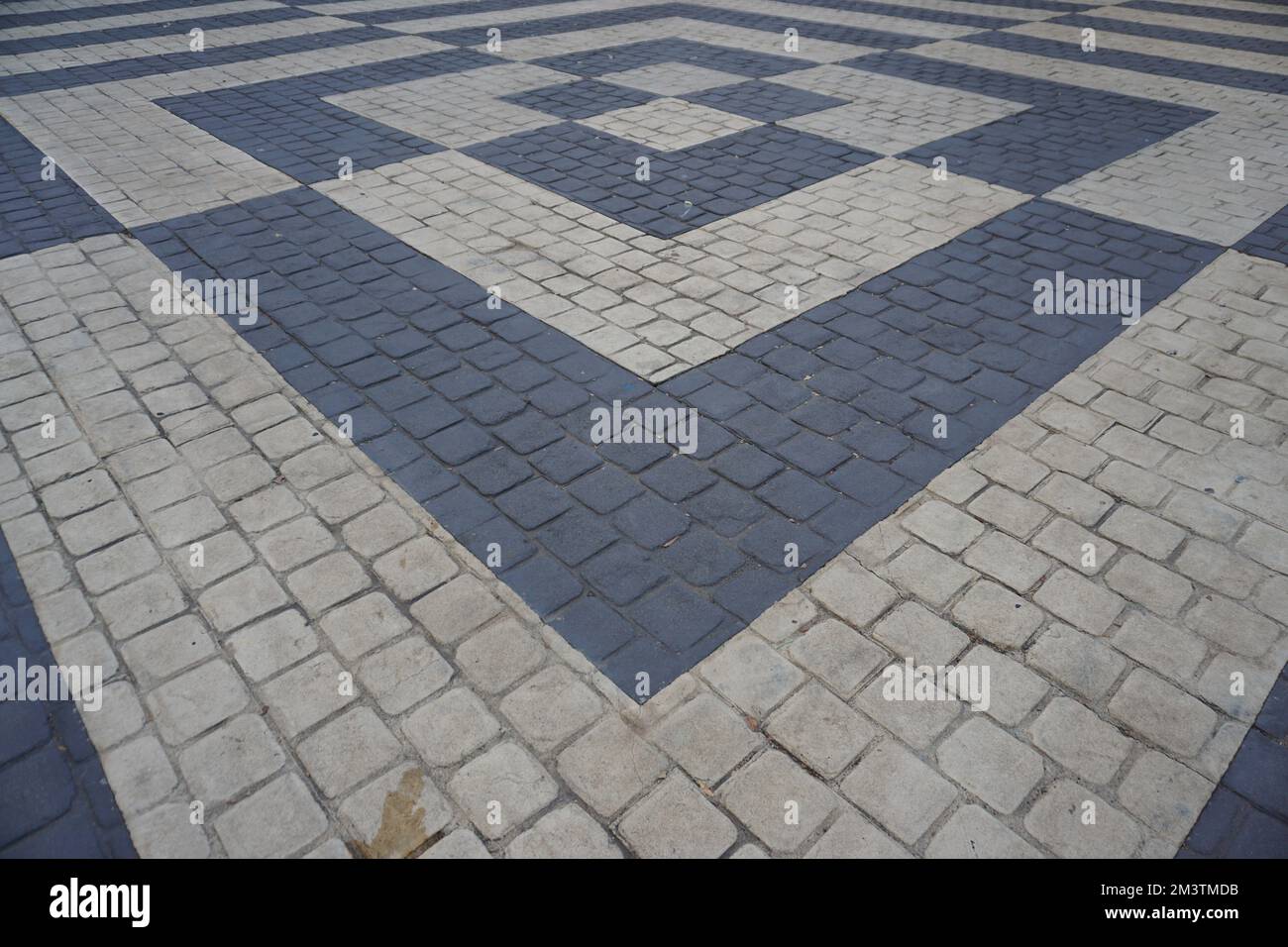 closeup of an unusual texture and design on the plaza ground on the ...