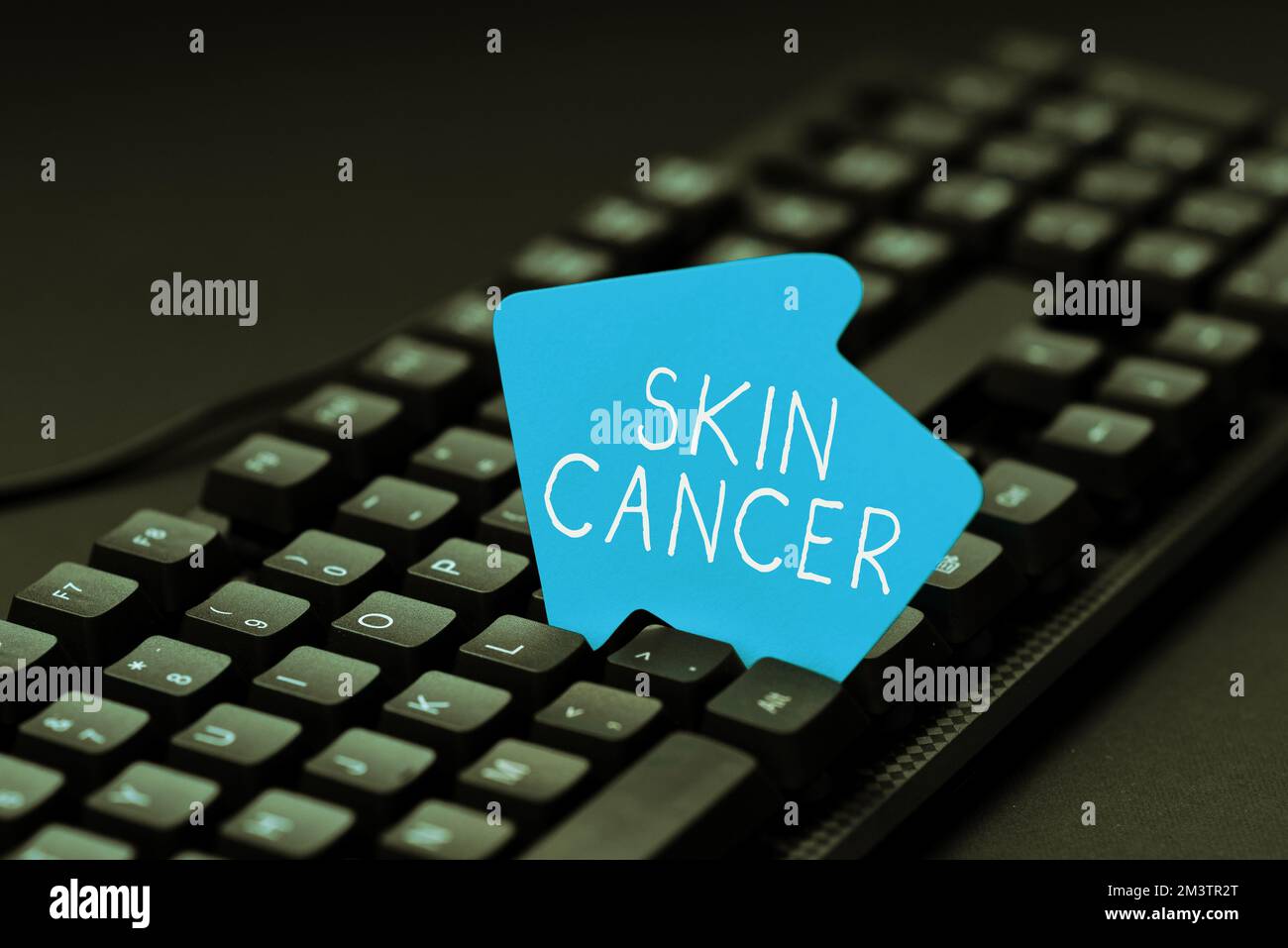 Hand writing sign Skin Cancer. Word Written on uncontrolled growth of ...