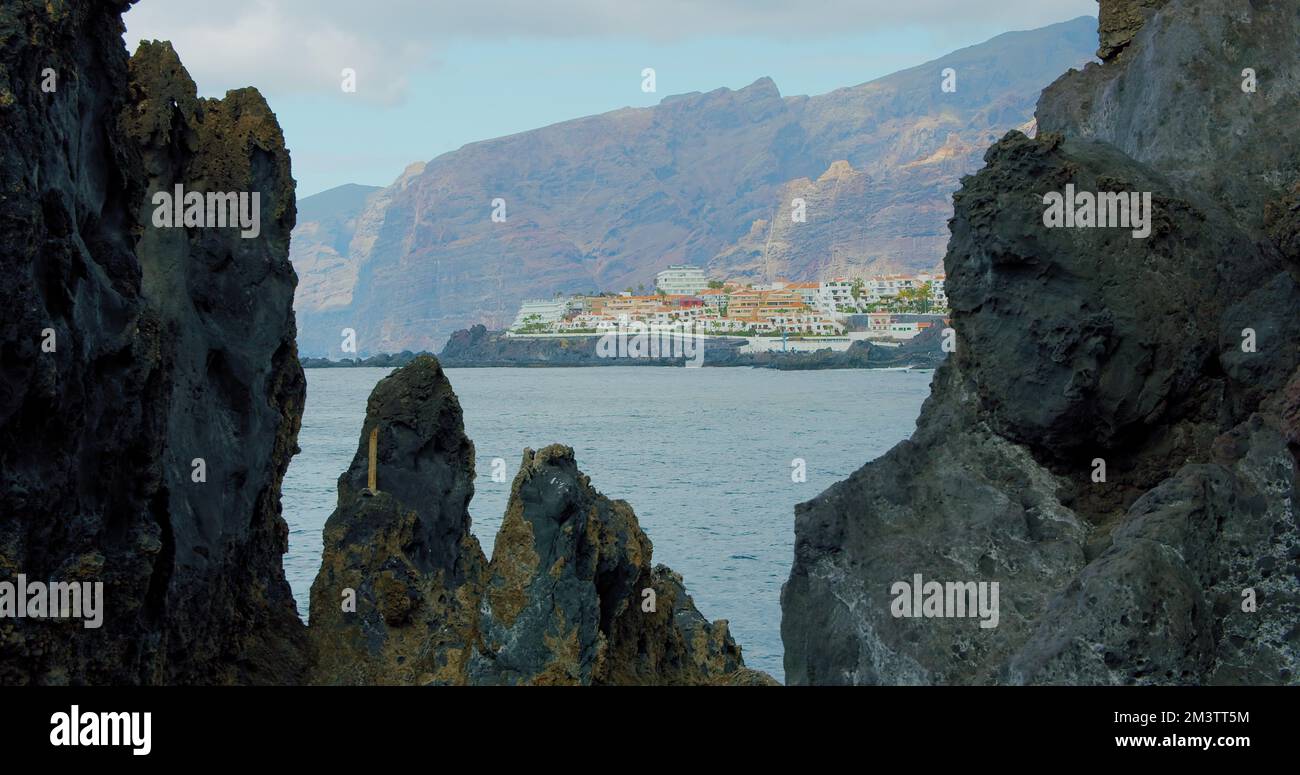 Charco del Diablo or natural pool of Devil, Atlantic Ocean lapping ...