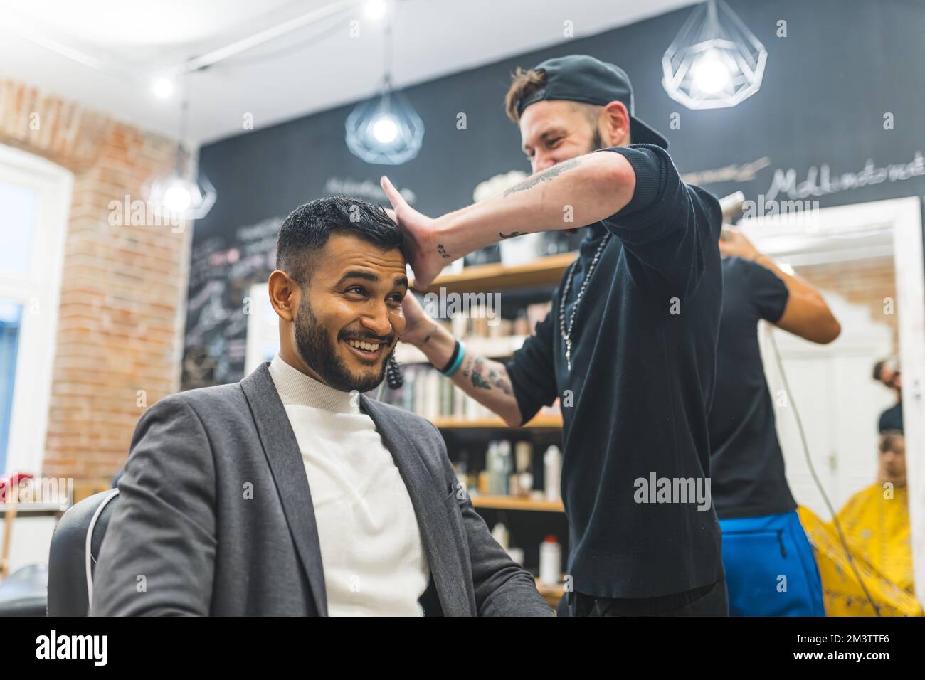 Man having hair cut salon hi-res stock photography and images - Alamy