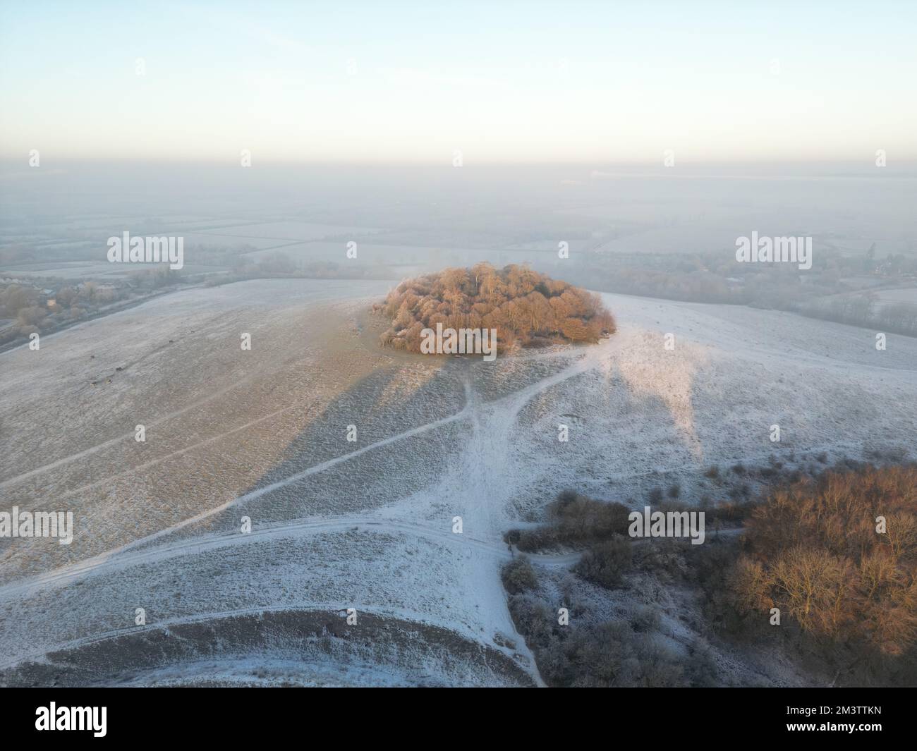 Wittenham Clumps Autumn snow aerial photography. Winter landscape ...