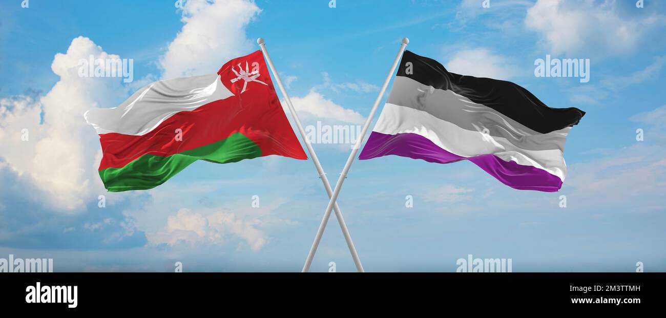 two crossed flags asexuality Pride and Oman waving in wind at cloudy ...