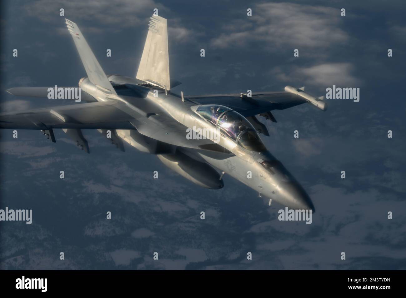 A U.S. Navy Boeing EA-18G Growler aircraft prepares to be refueled by a ...
