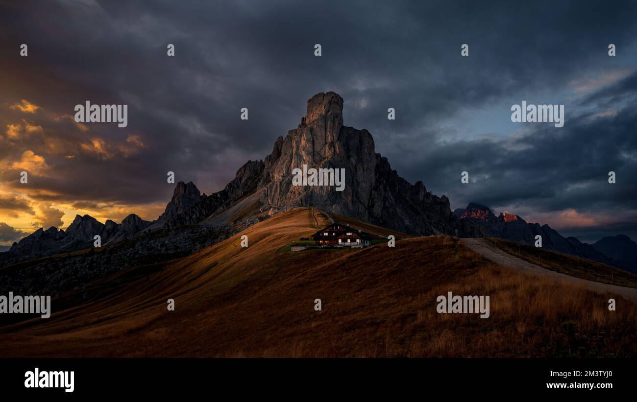 A beautiful view of a house in the middle of a rocky land surrounded by ...