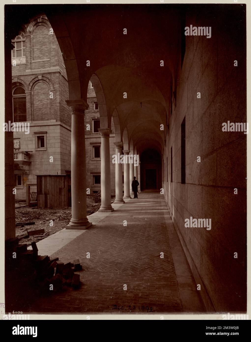 South wall of Courtyard showing length of arched walkway, construction ...