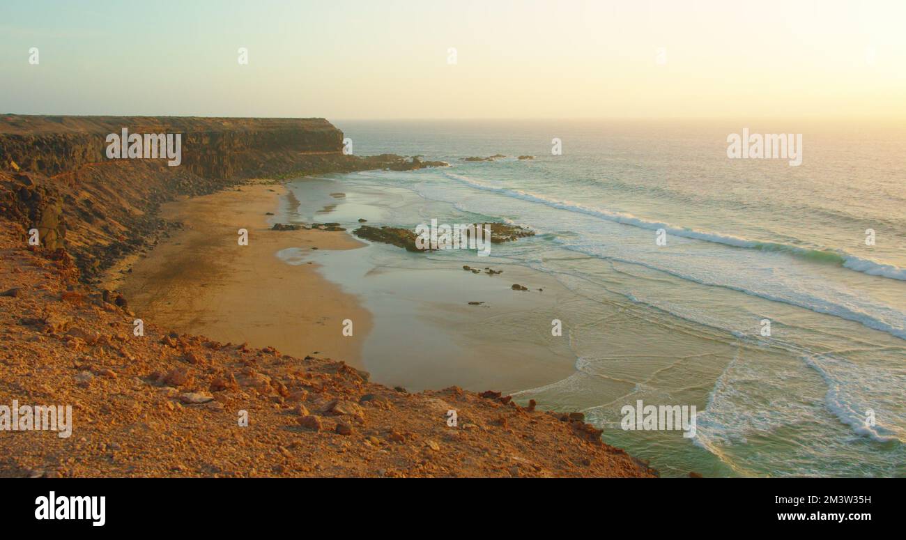 Rocky coastline alongside cliffside blue hi-res stock photography and ...