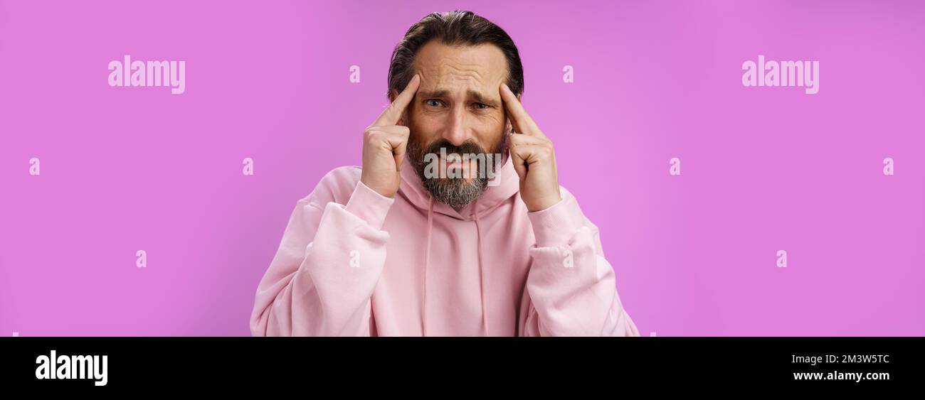 Distressed pressured intense worried mature caucasian man bearded grey ...