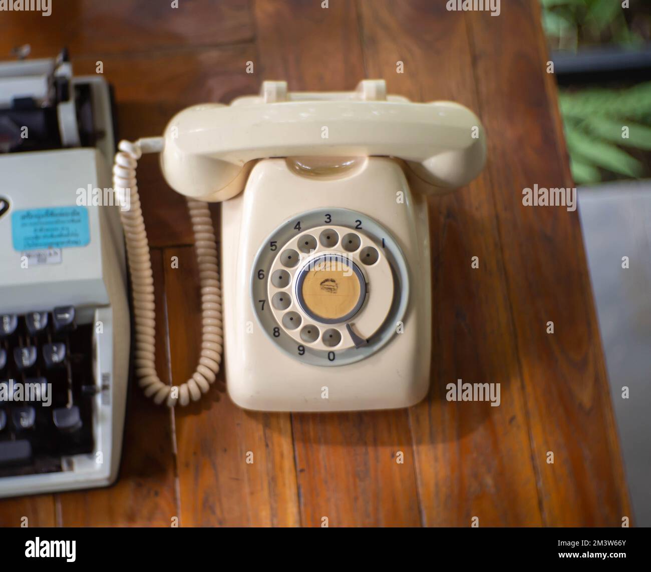 An old phone lying on the table Stock Photo - Alamy