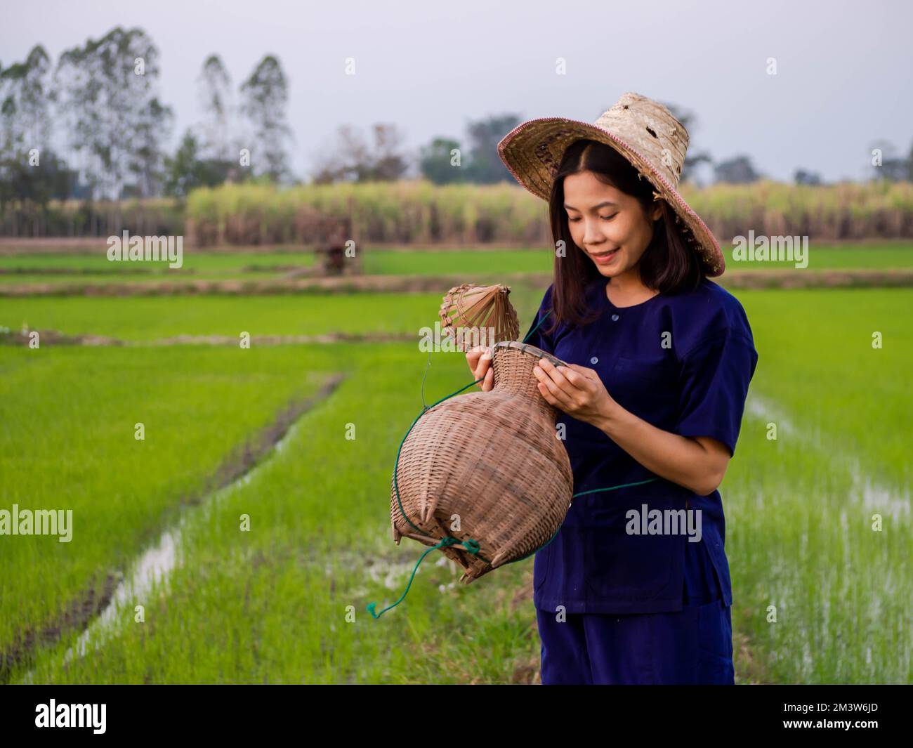 Young farmer wearing traditional Thai costumer Stock Photo - Alamy