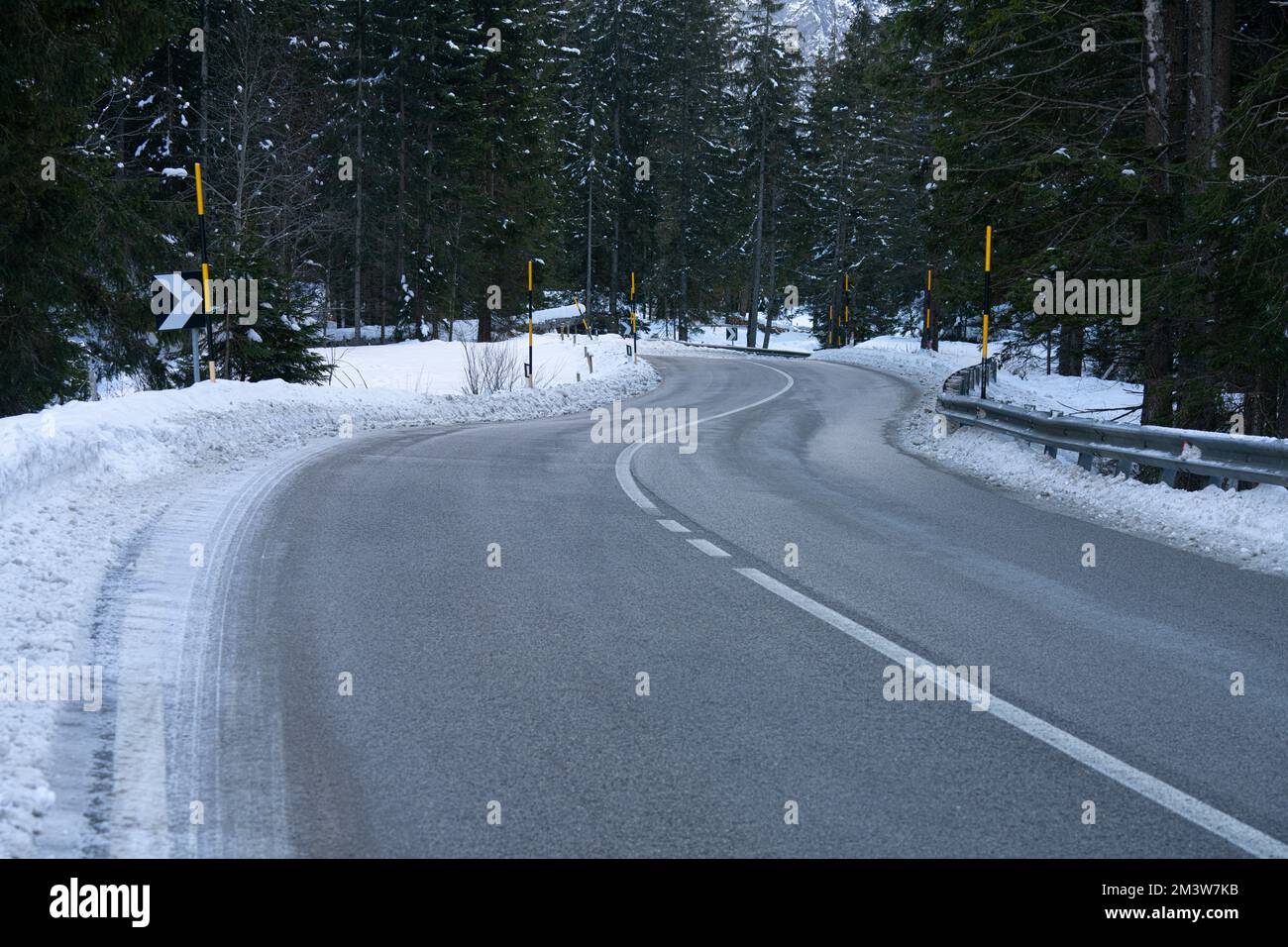 internal view of a road in a valley of the Italian Alps with snow Stock ...