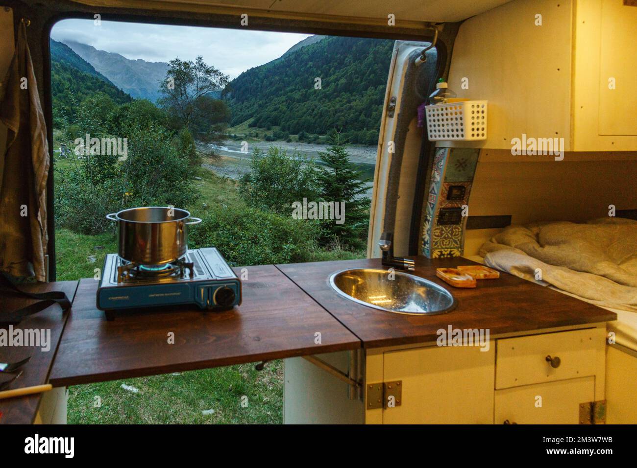 View out of a self built camper van with gas running stove outside to ...