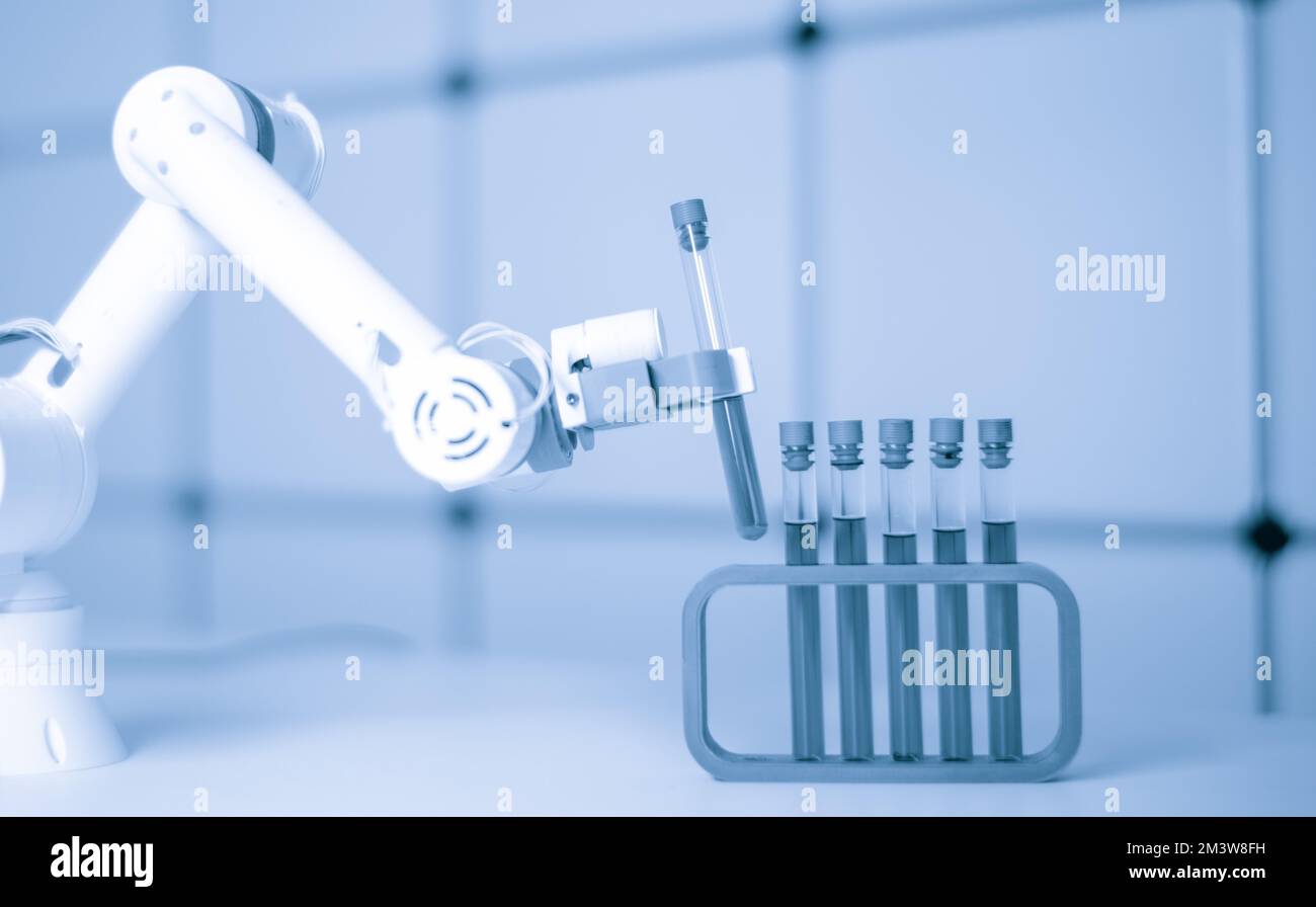 Robotic arm holding test tube Stock Photo - Alamy