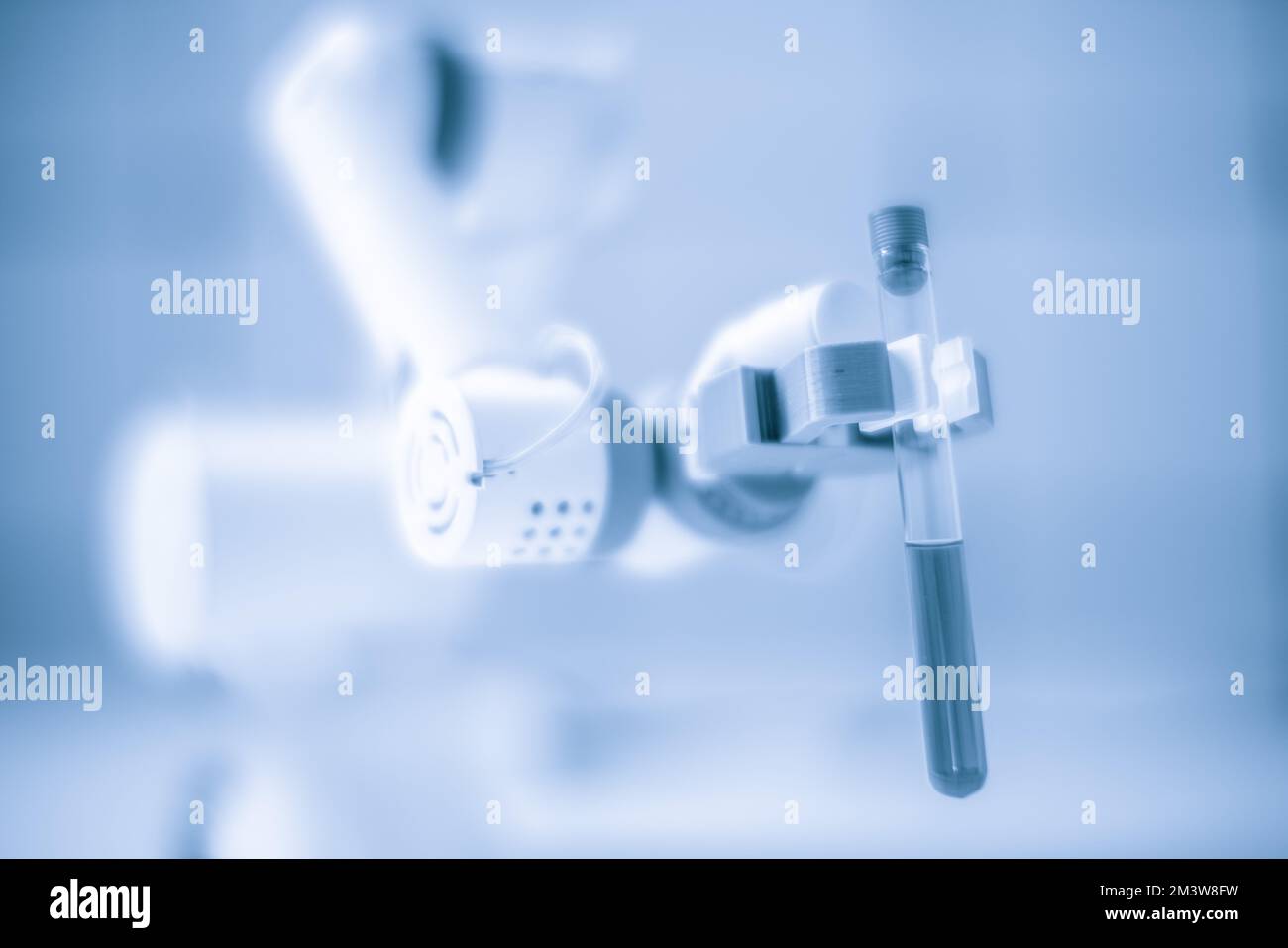 Robotic arm holding test tube Stock Photo - Alamy