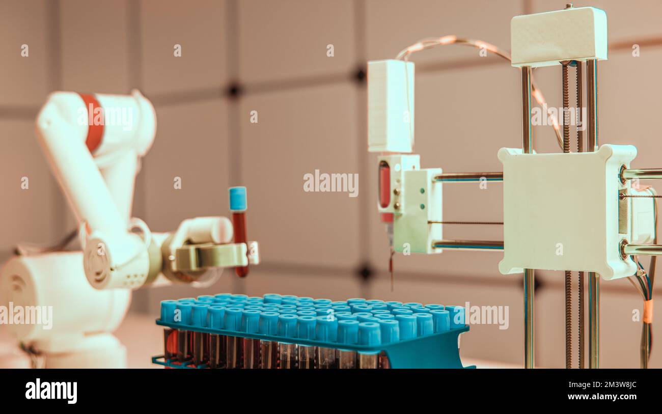 Robotic arm holding blood sample Stock Photo - Alamy