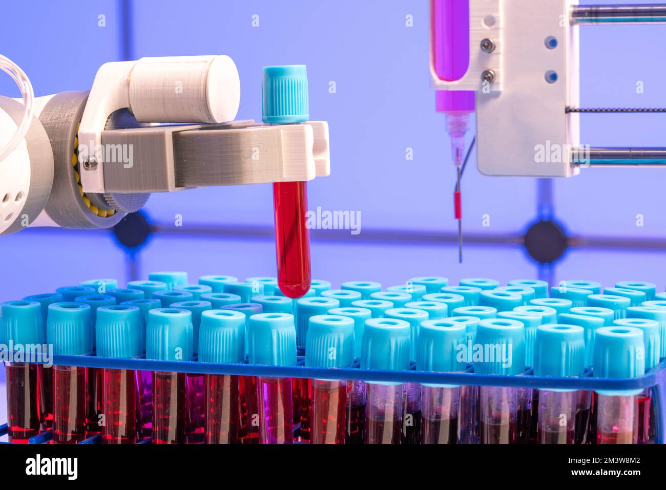 Robotic arm selecting a test tube Stock Photo - Alamy