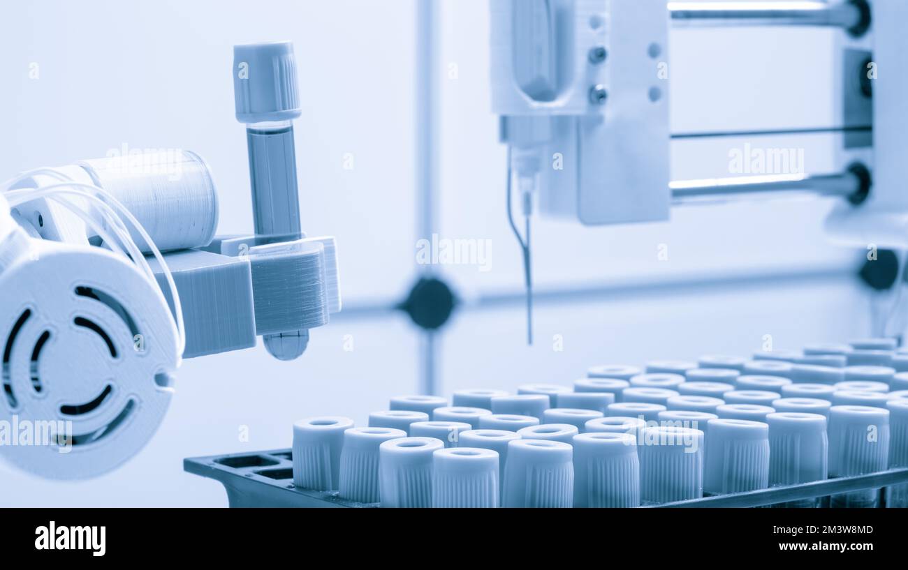 Robotic arm selecting a test tube Stock Photo - Alamy