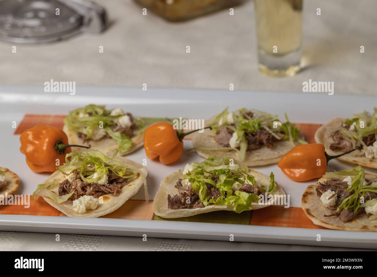 Close up of Chalupas, Typical Mexican dish made with tortillas, sauce ...