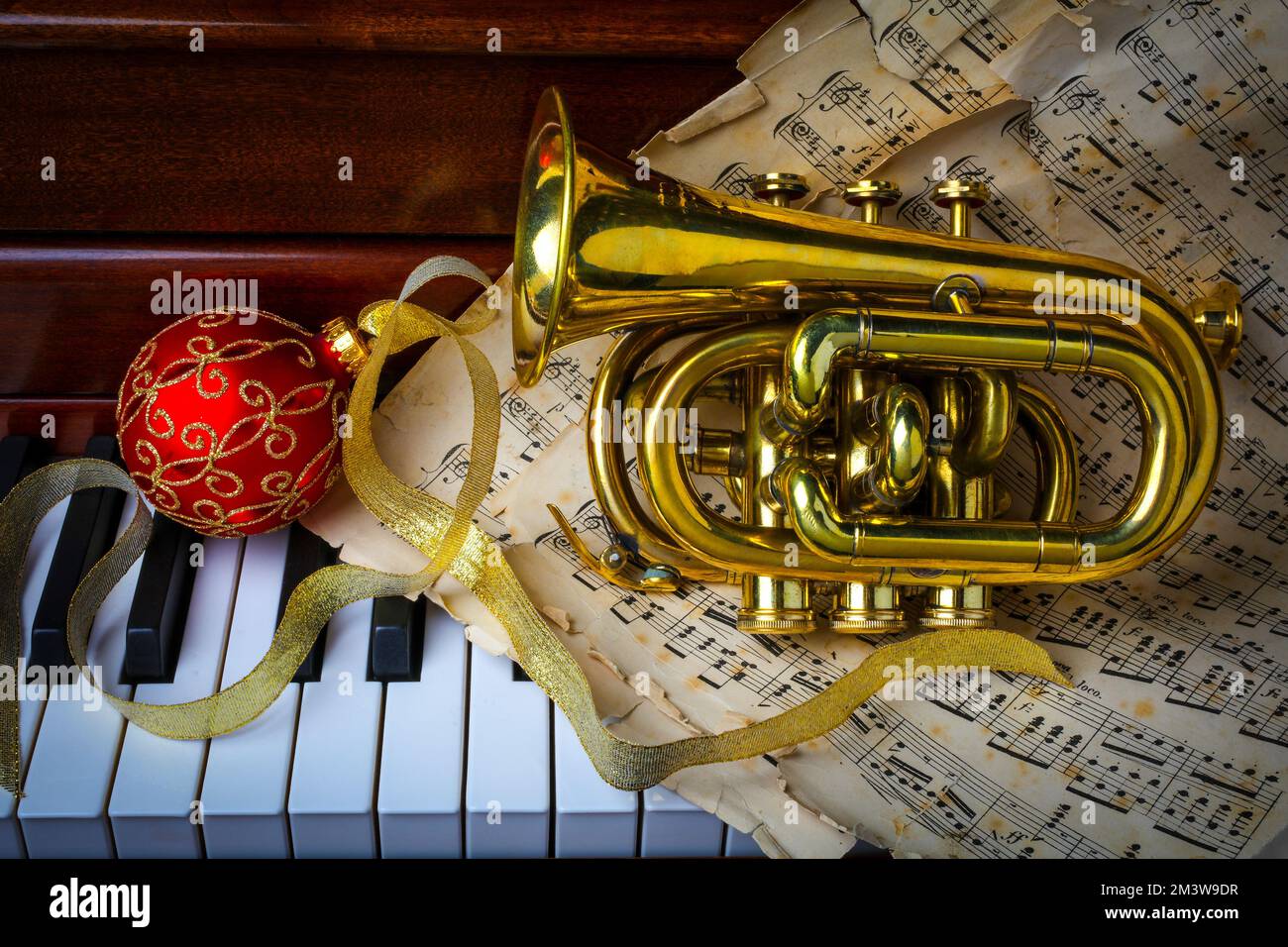 Pocket Trumpet On Piano And Sheet Music Still Life Stock Photo - Alamy