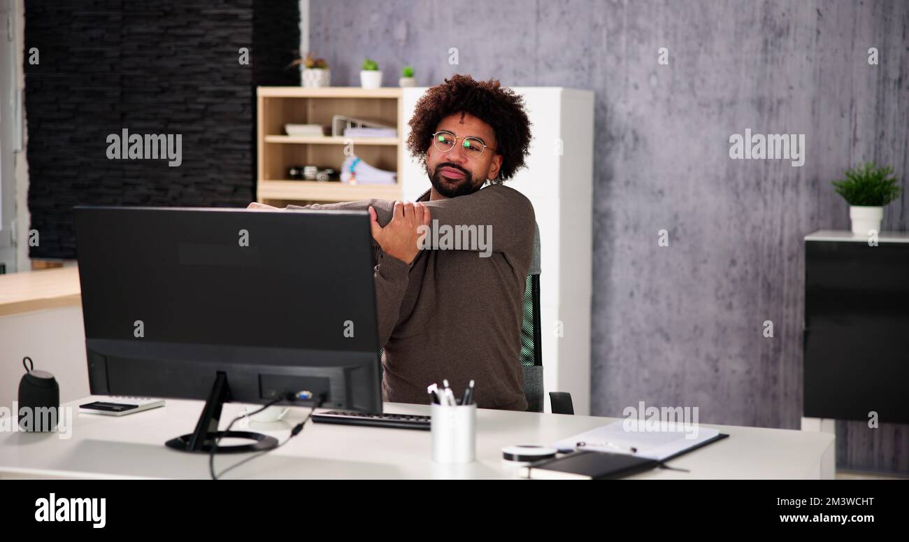 Stretch Exercise Workout At Office Business Desk Stock Photo - Alamy