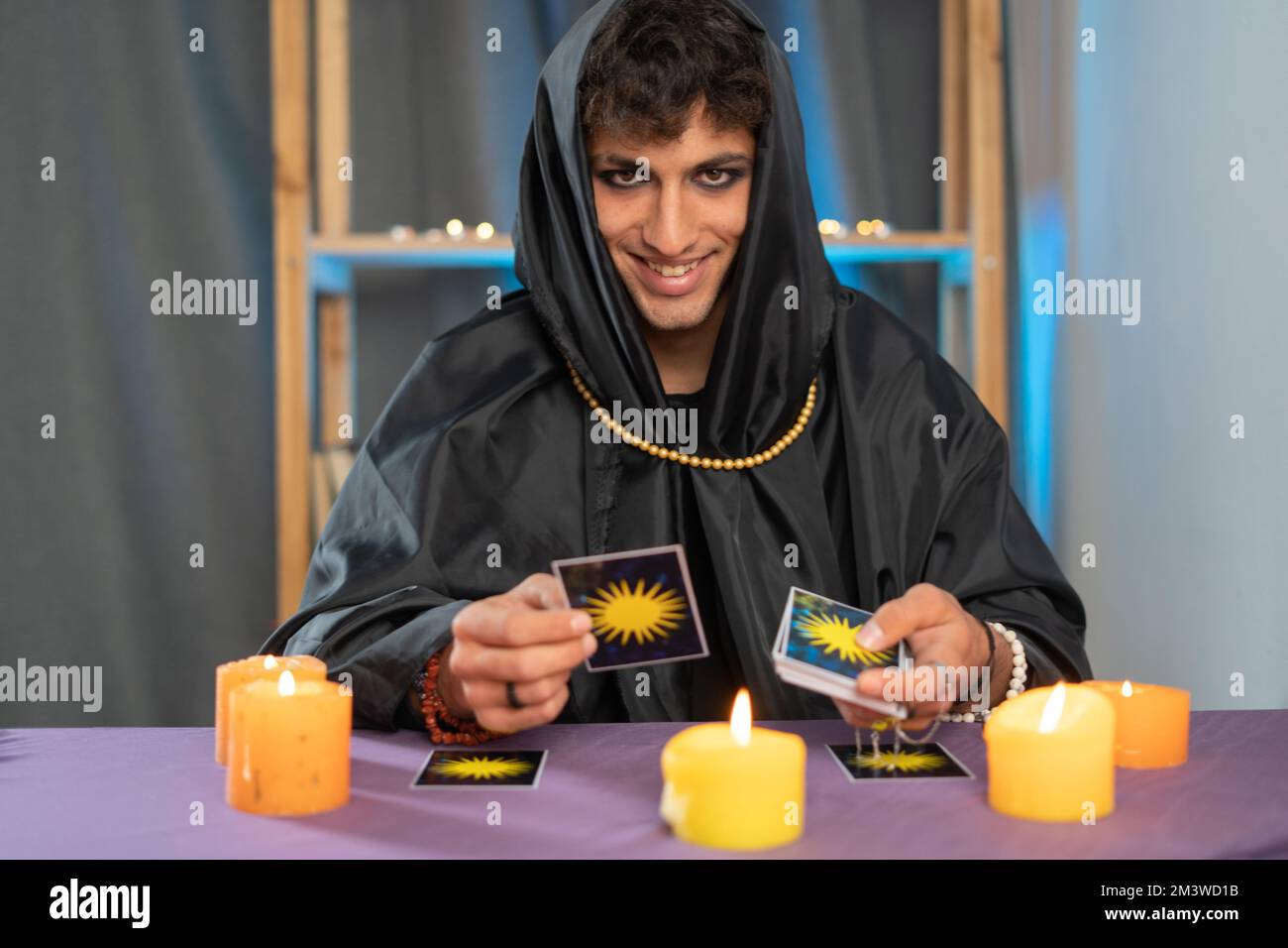 Male sorcerer tarot card reader hi-res stock photography and images - Alamy