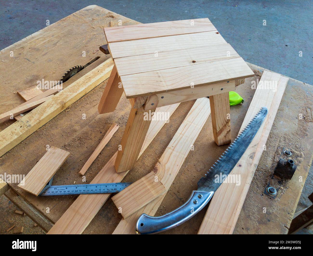 New wooden stool in the carpenter workshop Stock Photo - Alamy