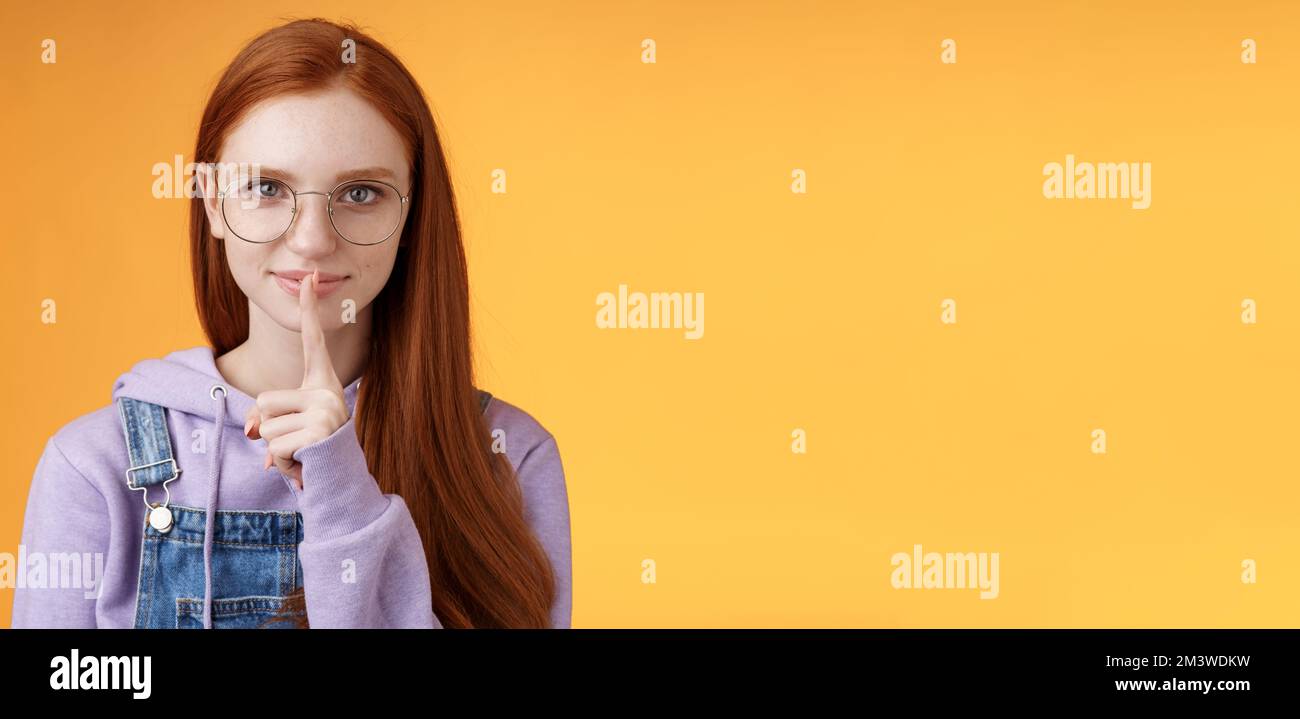 Shh secret safe. Young sensual mysterious redhead attractive woman ...